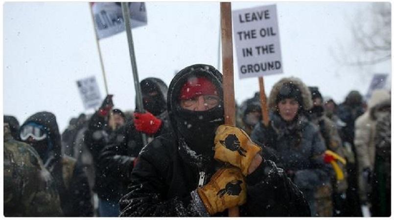 Pipeline protesters pray, set fires ahead of camp closing - Loop News