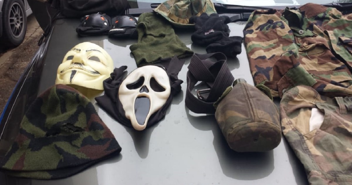 Masks and army fatigues seized by security forces in Westmoreland ...