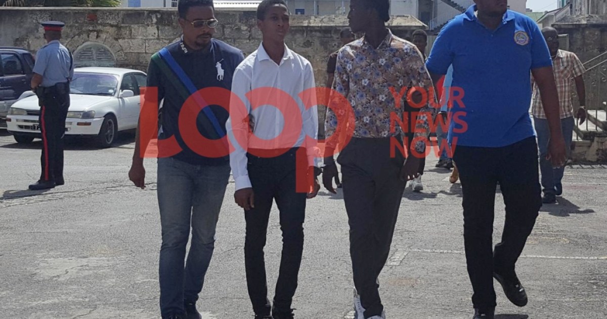 VIDEO: Four charged for 'Bread man' murder escorted to prison bus ...