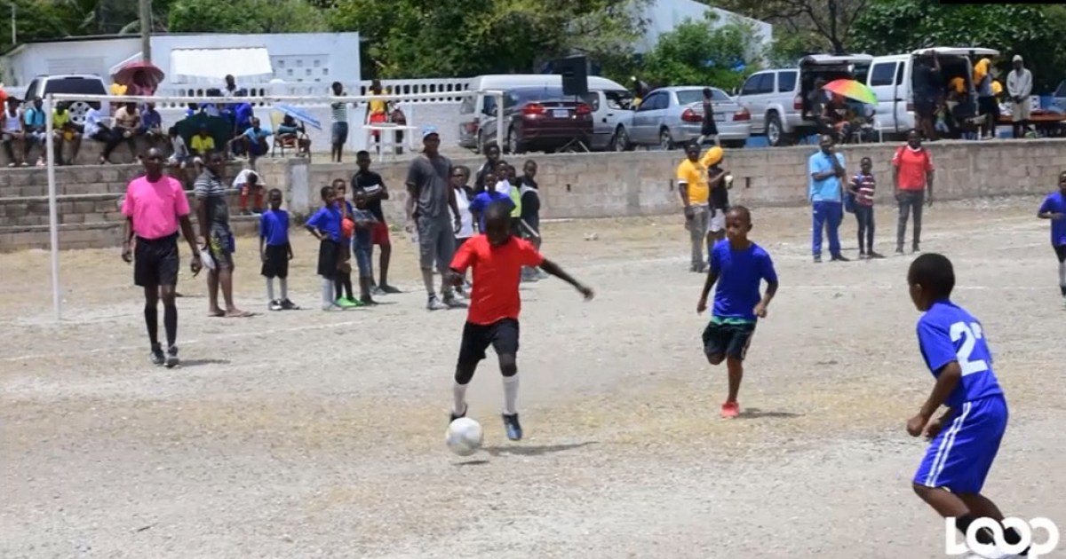 Joanna Webley launches football programme for E Rural St Andrew youths - Loop News