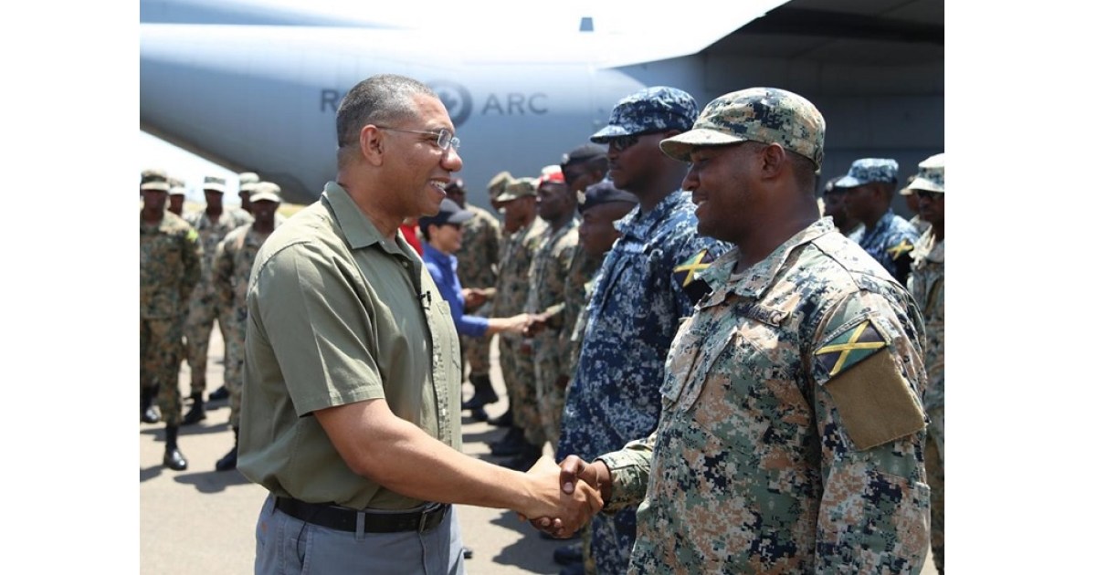 WATCH: Holness sends off JDF soldiers ahead of Bahamas relief mission ...