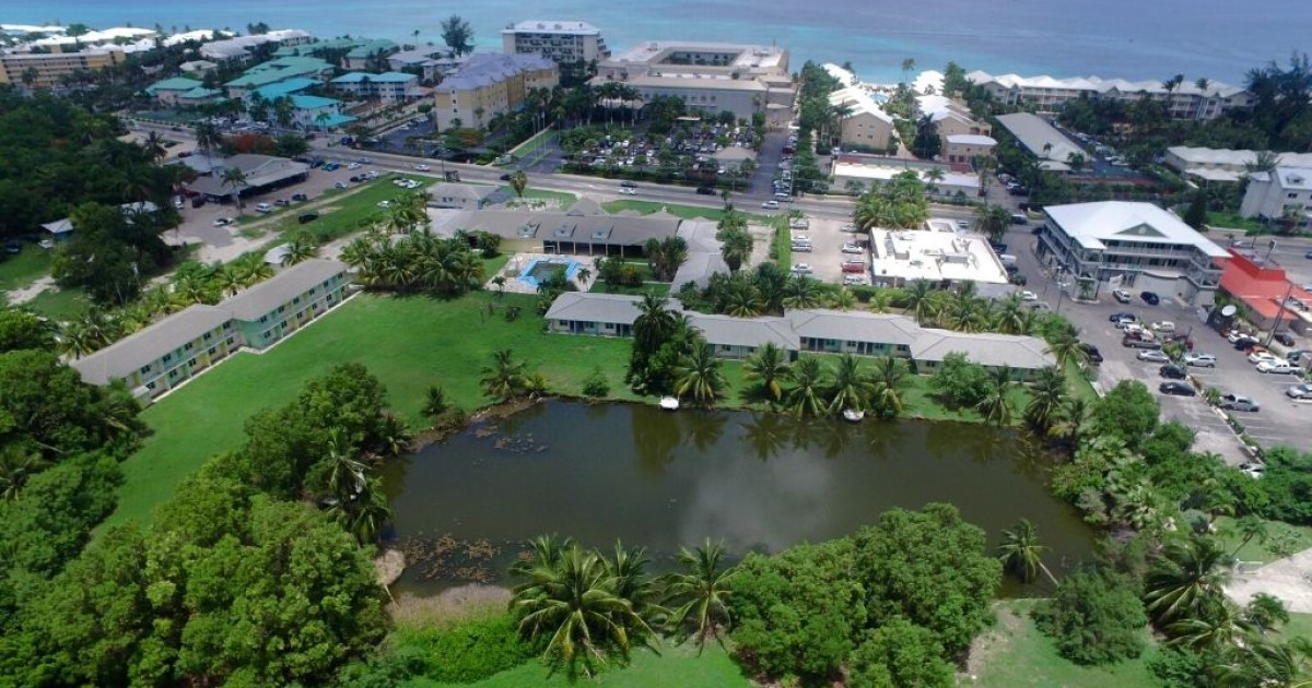 Iconic Caymanian property, The Cayman Islander, sells for $18 million ...