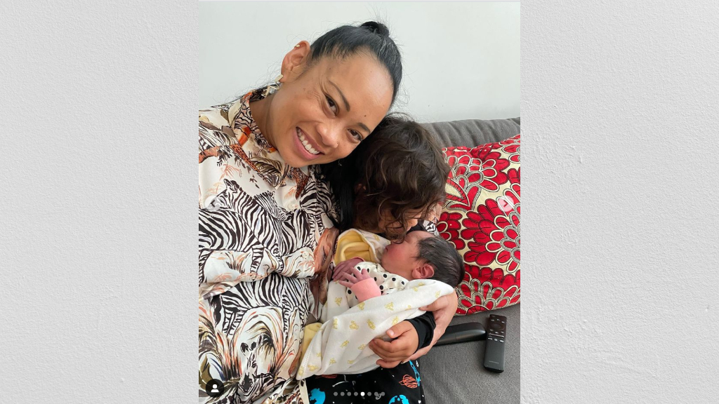 Anya Ayoung Chee smiles as her three-year-old son Kairi dotes over his ...